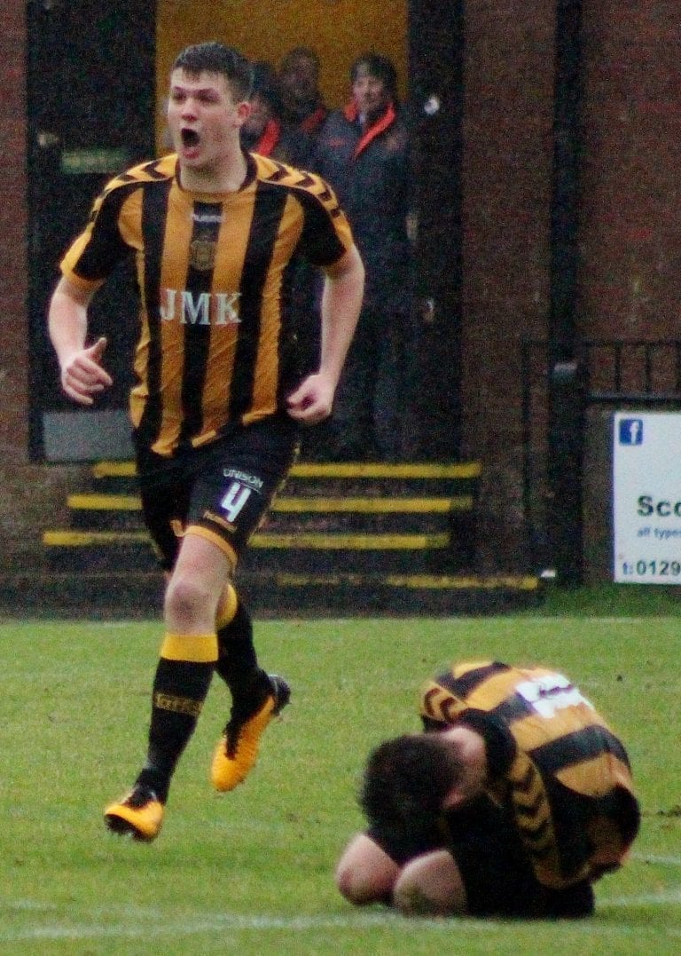 Jamie Glasgow curls up in pain after getting brought down and McPherson ...